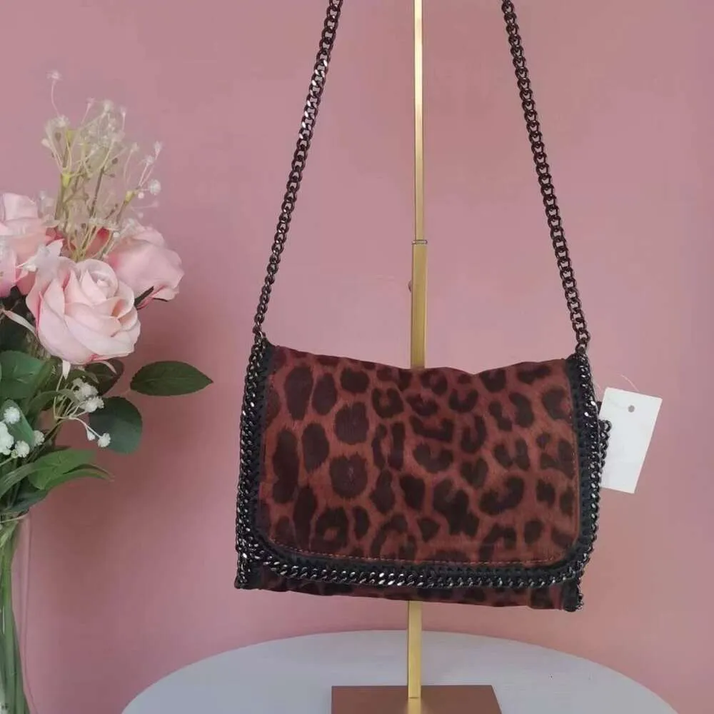 DHgate.com:Designer Stella Womens Bag: Leather Chain Single Crossbody ...