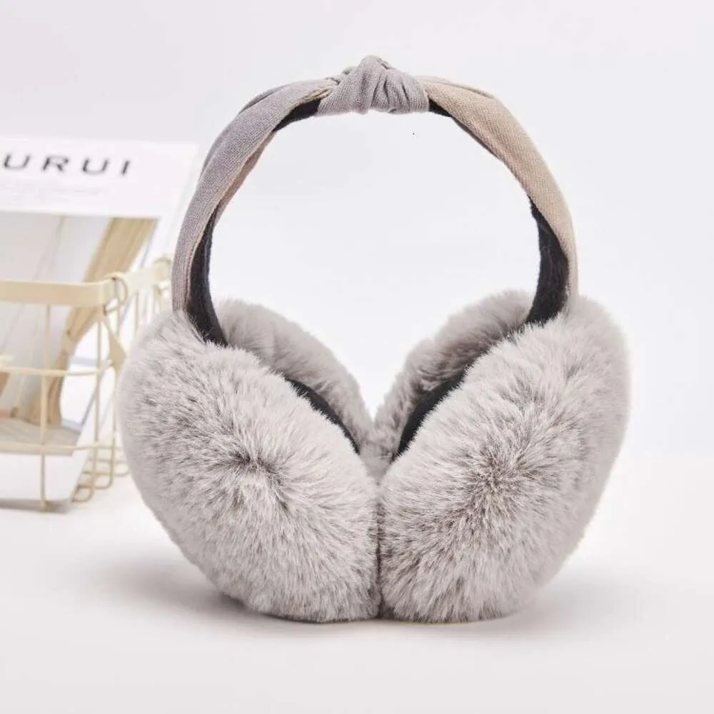 DHgate.com:Plush Panda Earmuffs: Cozy Winter Ear Warmers for Unmatched ...