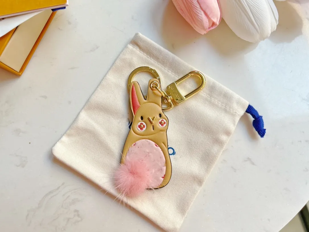 DHgate.com:2024Unisex Furry Key Wallet Key Chain Rabbit Plush Bag ...
