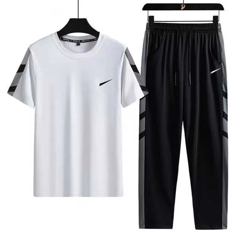 DHgate.com:Men's Designer Silk Tracksuit Set, Short Sleeve Shorts and ...