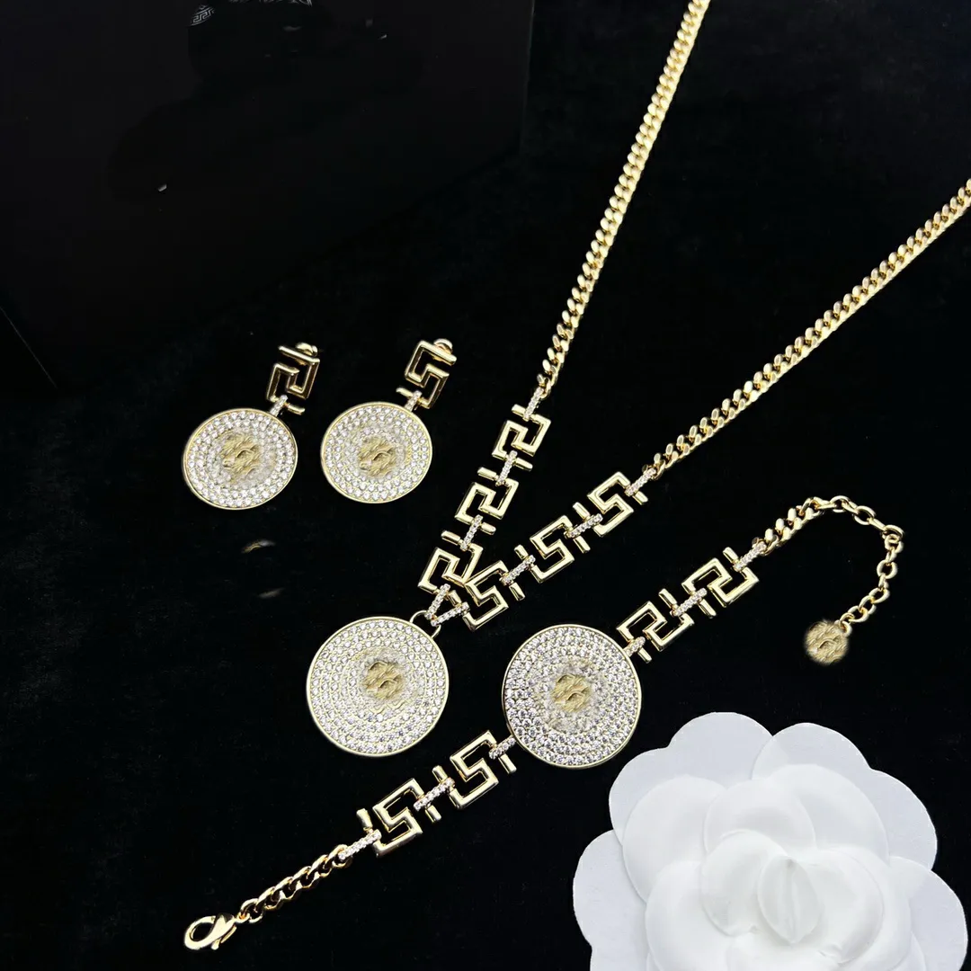 DHgate.com:Brassy Elegance: Diamond Encrusted Pendant, Earrings, and ...