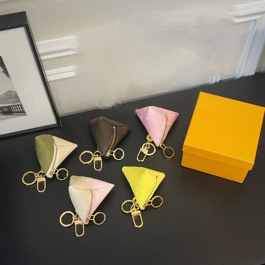 DHgate.com:Luxury Brand Women Coin Purses With Keychain Colored Letter ...