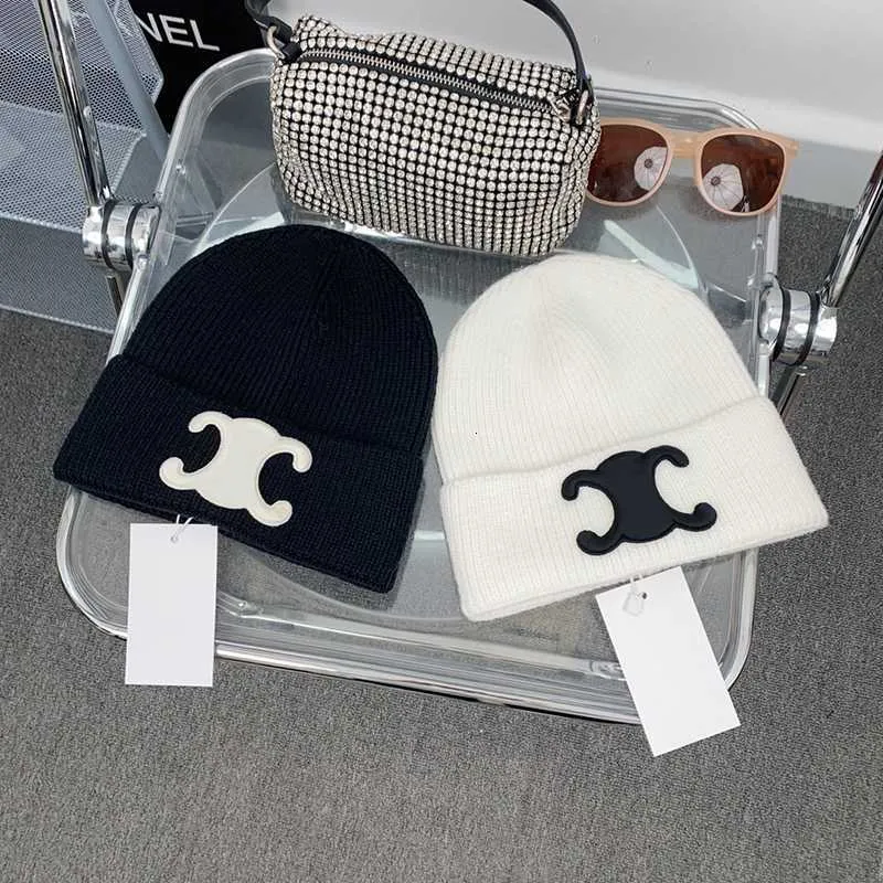 DHgate.com:Winter Desingers Luxurys Beanie Warm Knitted Cap Ear ...