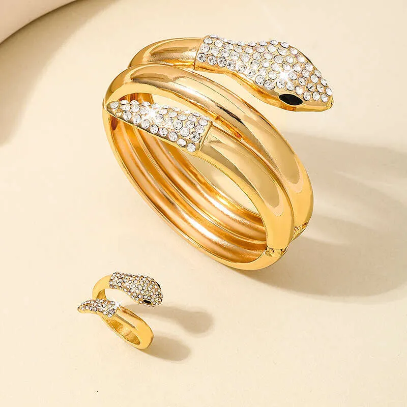 2-piece personalized metal snake head bracelet ring set with peridot ...