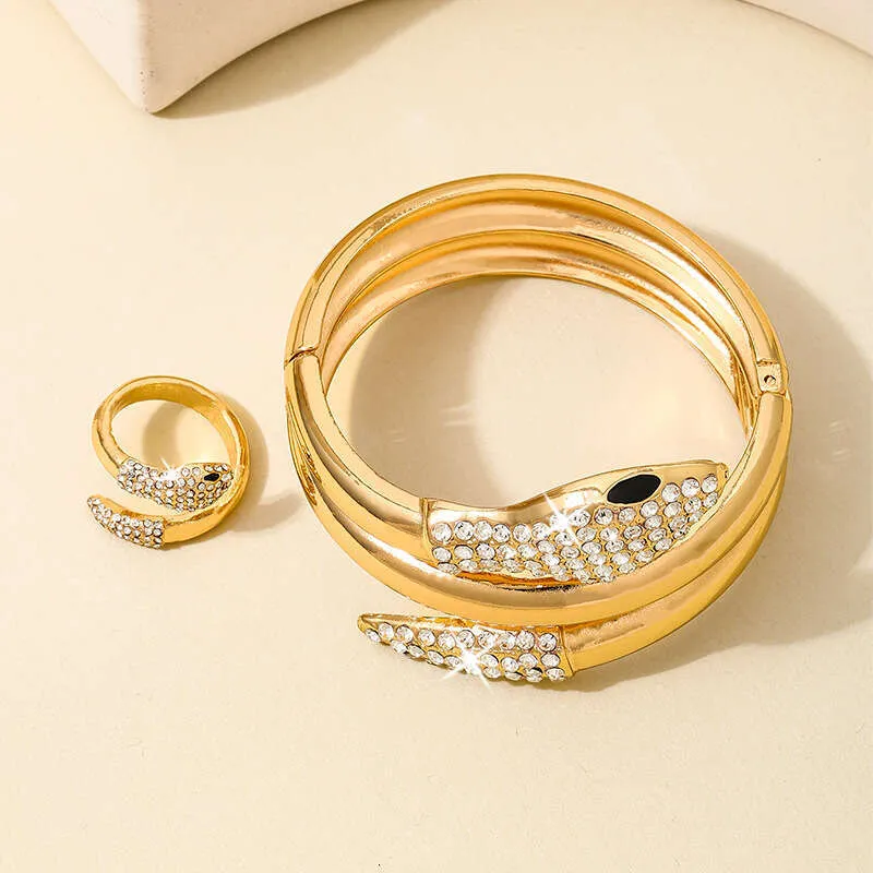 2-piece personalized metal snake head bracelet ring set with peridot ...