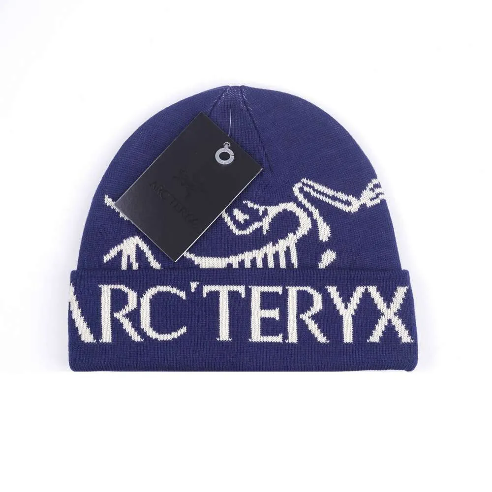 Bird A RC'TERYXx Designer Leather Beanie with Embroidered Bird Head ...