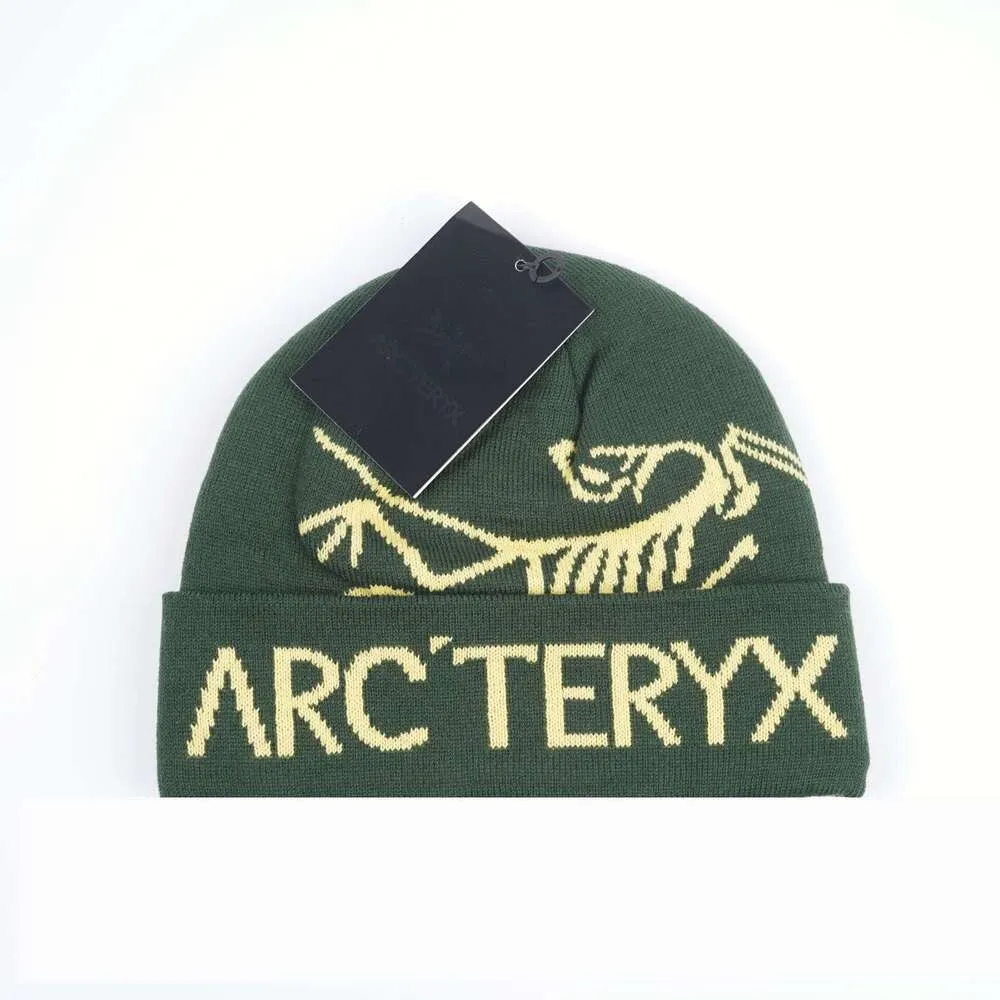 Bird A RC'TERYXx Designer Leather Beanie with Embroidered Bird Head ...