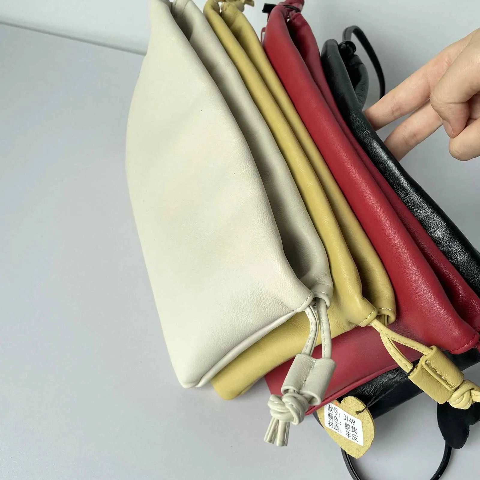 Sheepskin drawstring cloud bag mini zipper closure genuine leather ...