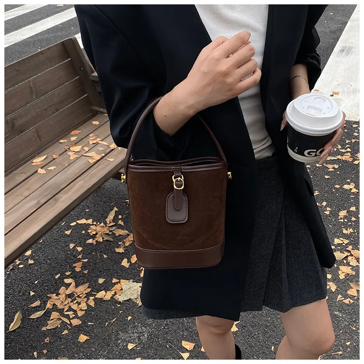 Medium barrel-shaped PU leather women's fashion shoulder handbag with ...