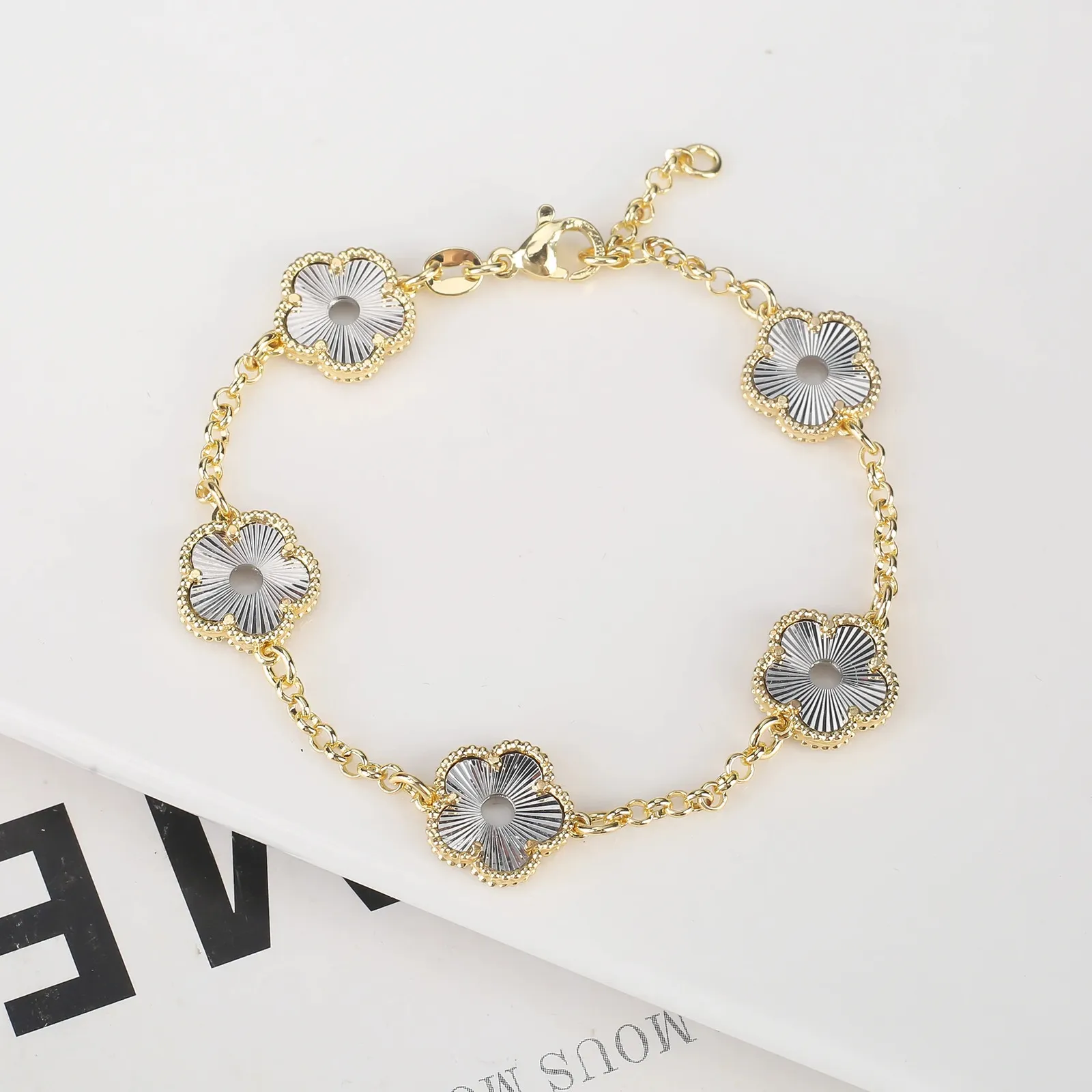 Hollow Metal Double-Sided Clover and Plum Blossom Jewelry Set for Women ...