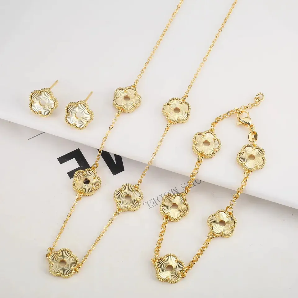 Hollow Metal Double-Sided Clover and Plum Blossom Jewelry Set for Women ...