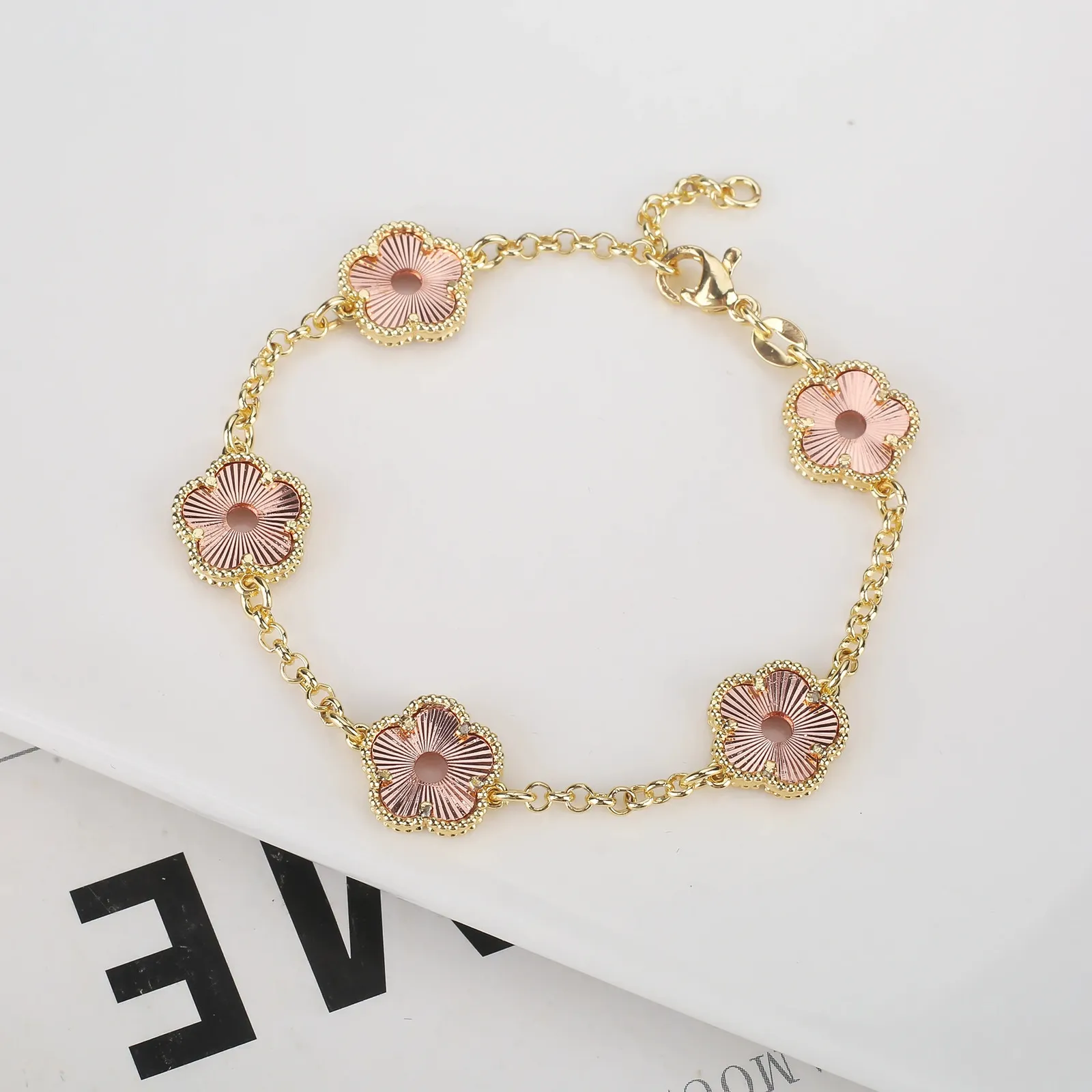 Hollow Metal Double-Sided Clover and Plum Blossom Jewelry Set for Women ...