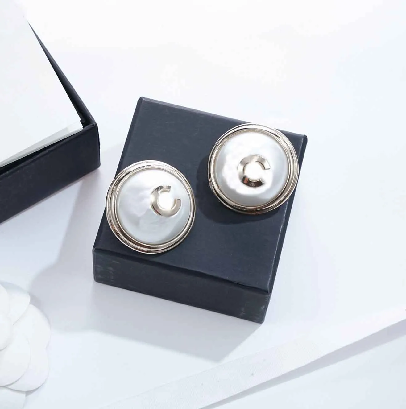 Luxury round shape stud earrings with white mother-of-pearl beads in ...