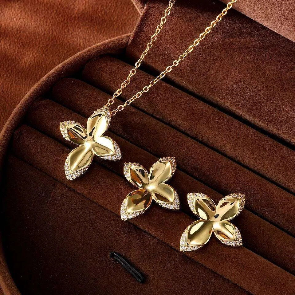 ZAKOL Copper and Brass Micro-inlaid Black Cubic Zirconia Four-leaf ...