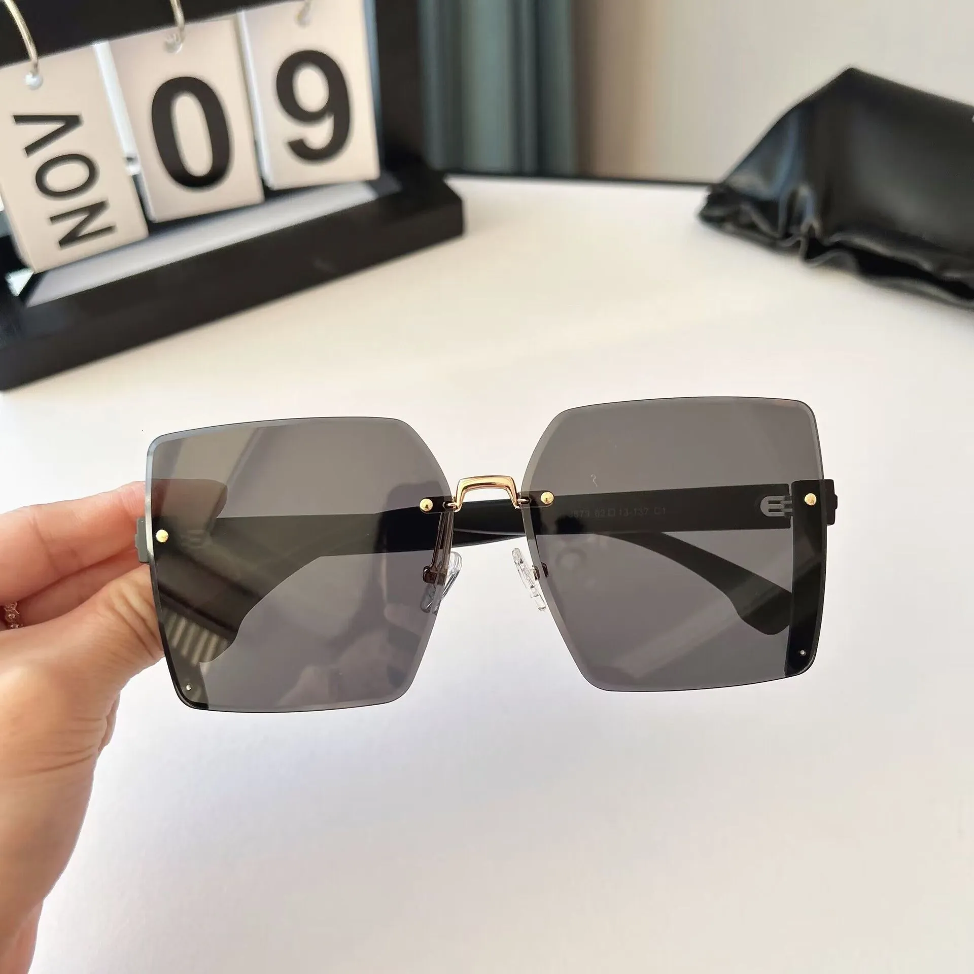 Designer Chrome Cross Sunglasses Over Prescription Glasses For Women ...