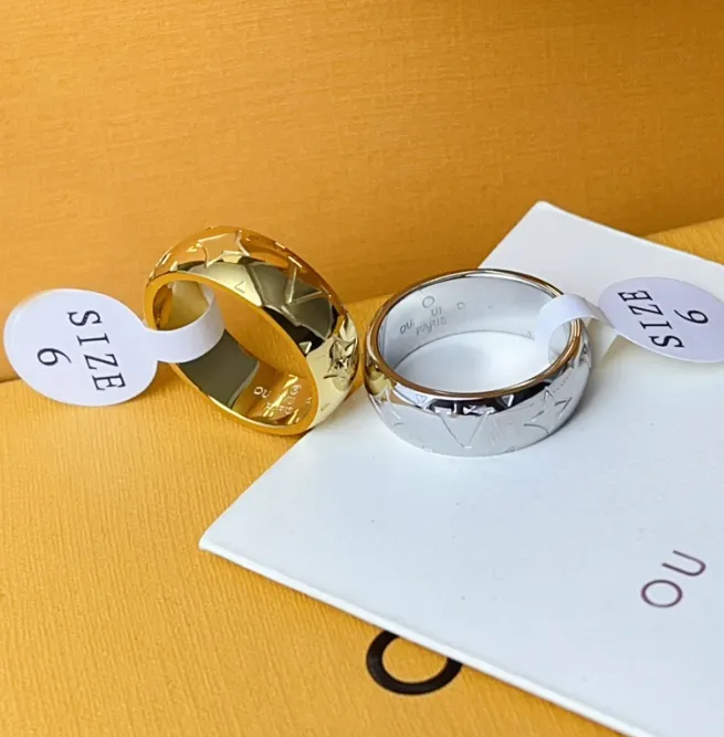 Fashion designer titanium steel couple rings with monogram embossed ...