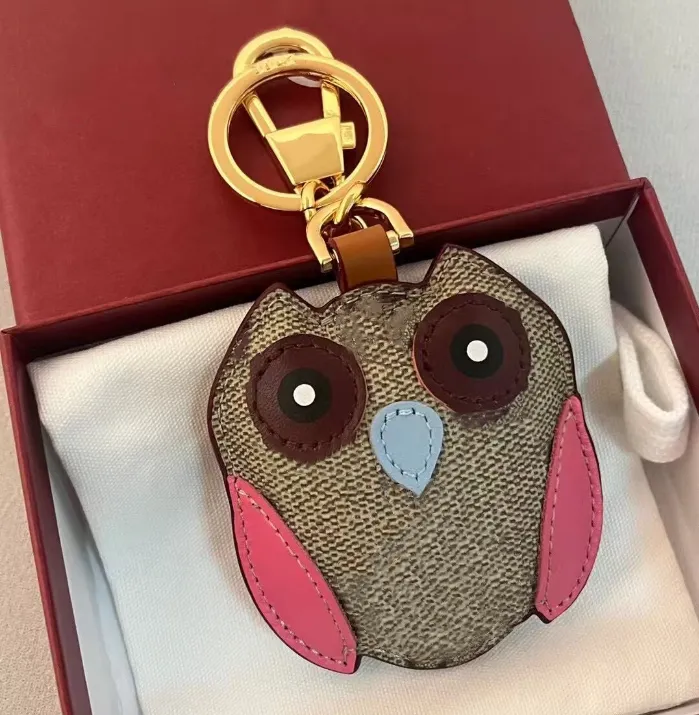 Trendy Designer Bag Charm Keychain: Lady GGs Upscale Leather Cartoon ...