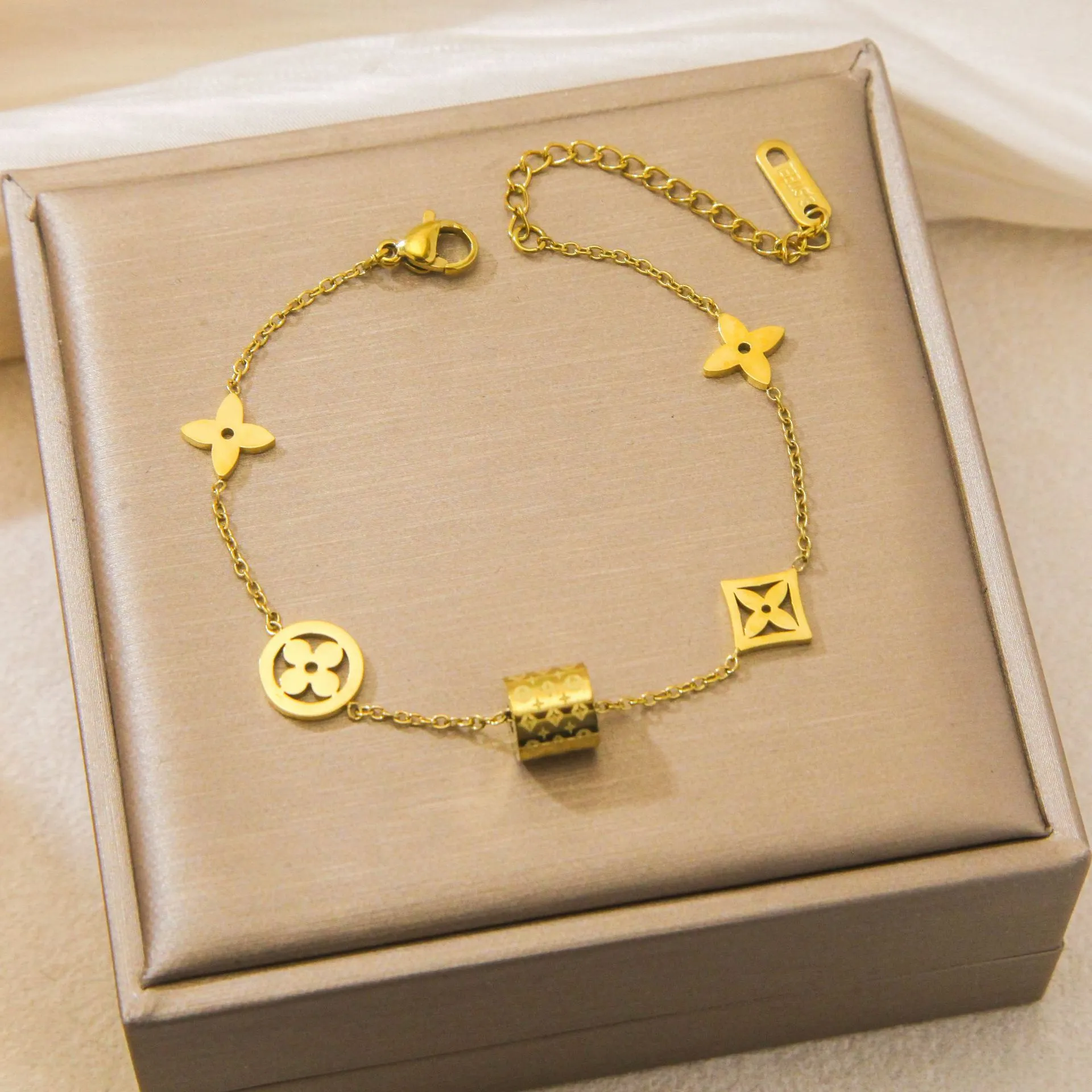 Designer Gold Necklace Bracelet Collection: Titanium Steel Earrings ...