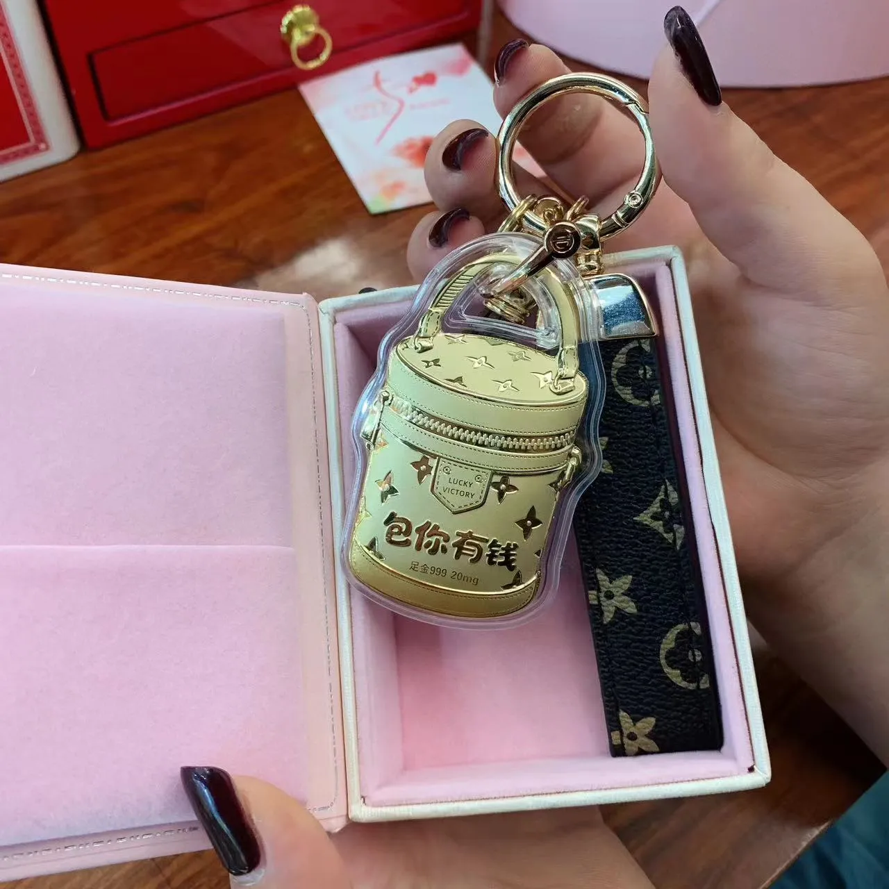 Chinese Culture Keychain With Fun Text Design Gold Infused Bucket Bag ...
