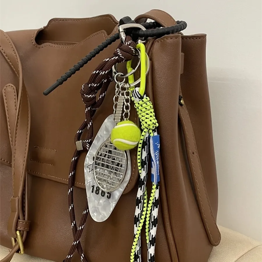 Badminton keychain or generic sports charm: which one says I love ...