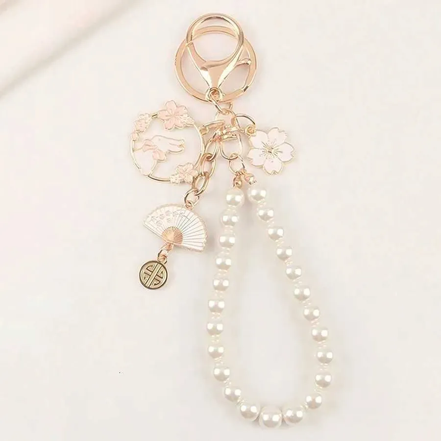 Fan keychain vs pom pom keychain: Which is less likely to fall apart ...