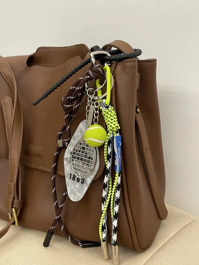 Badminton keychain or generic sports charm: which one says I love ...