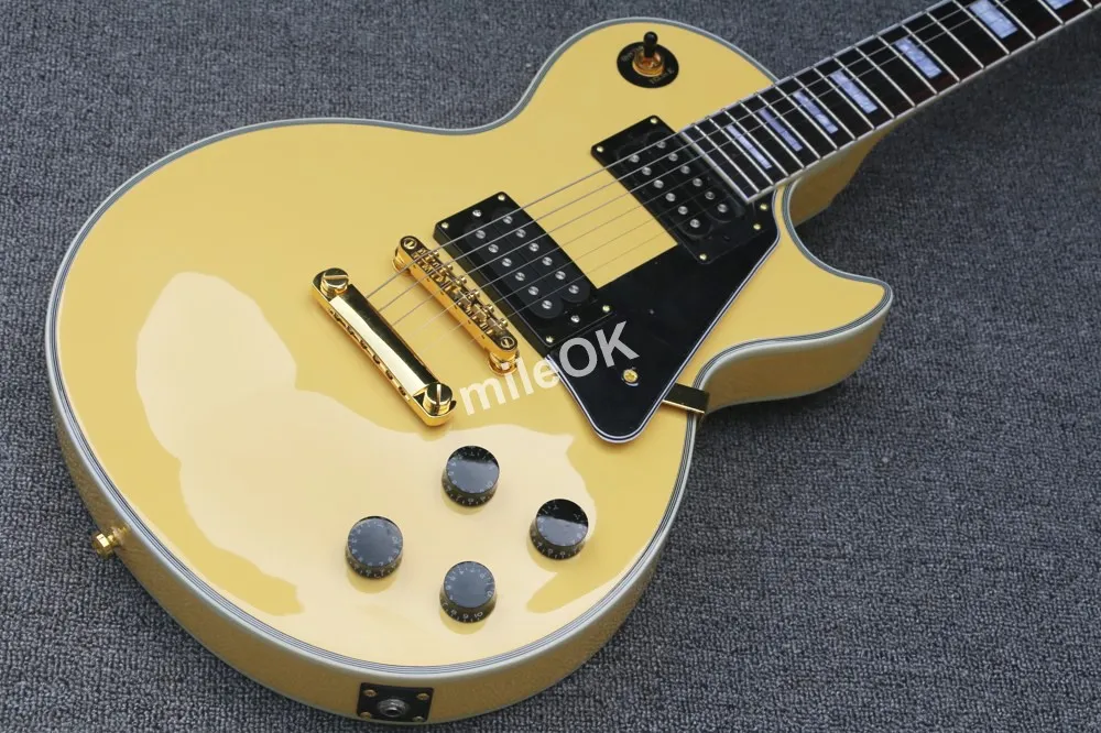 DHgate.com:1974 LP Custom VOS Steve Jones Electric Guitar, Golden ...