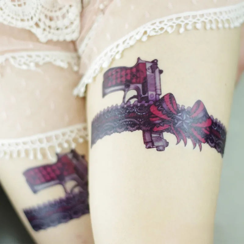 Bow on leg tattoo photos - Wisconsintattoocompany.com