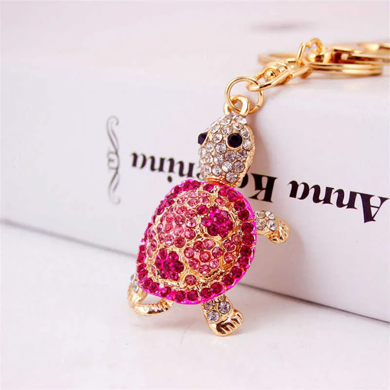 Fantasy Gold Rhinestone Torch Keychain With Animal Turtle Design ...