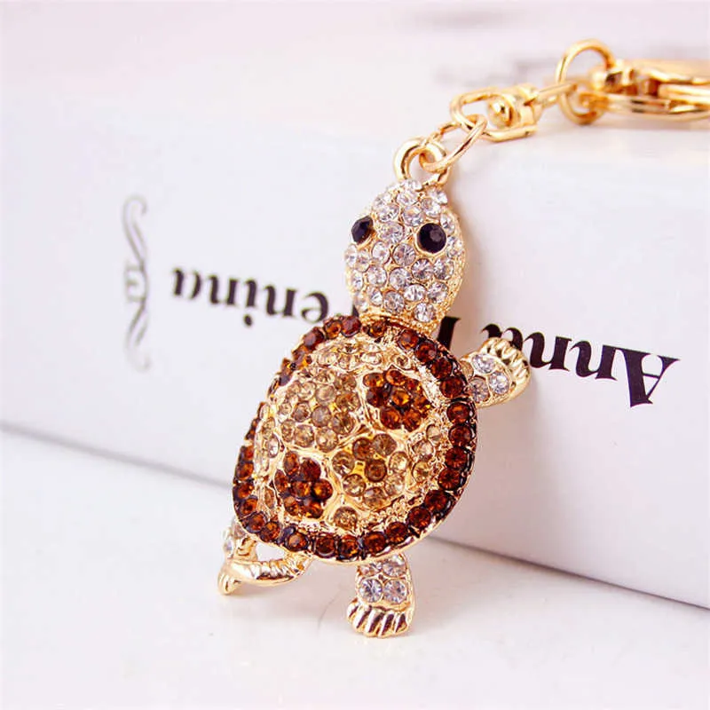 Fantasy Gold Rhinestone Torch Keychain With Animal Turtle Design ...