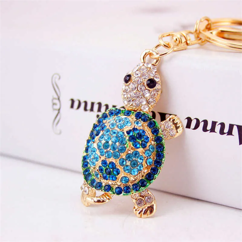 Fantasy Gold Rhinestone Torch Keychain With Animal Turtle Design ...