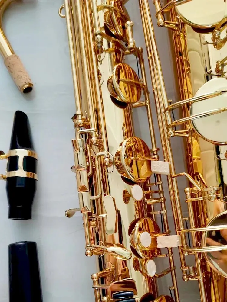 DHgate.com:Golden professional Baritone saxophone flat E-tune upgrade ...